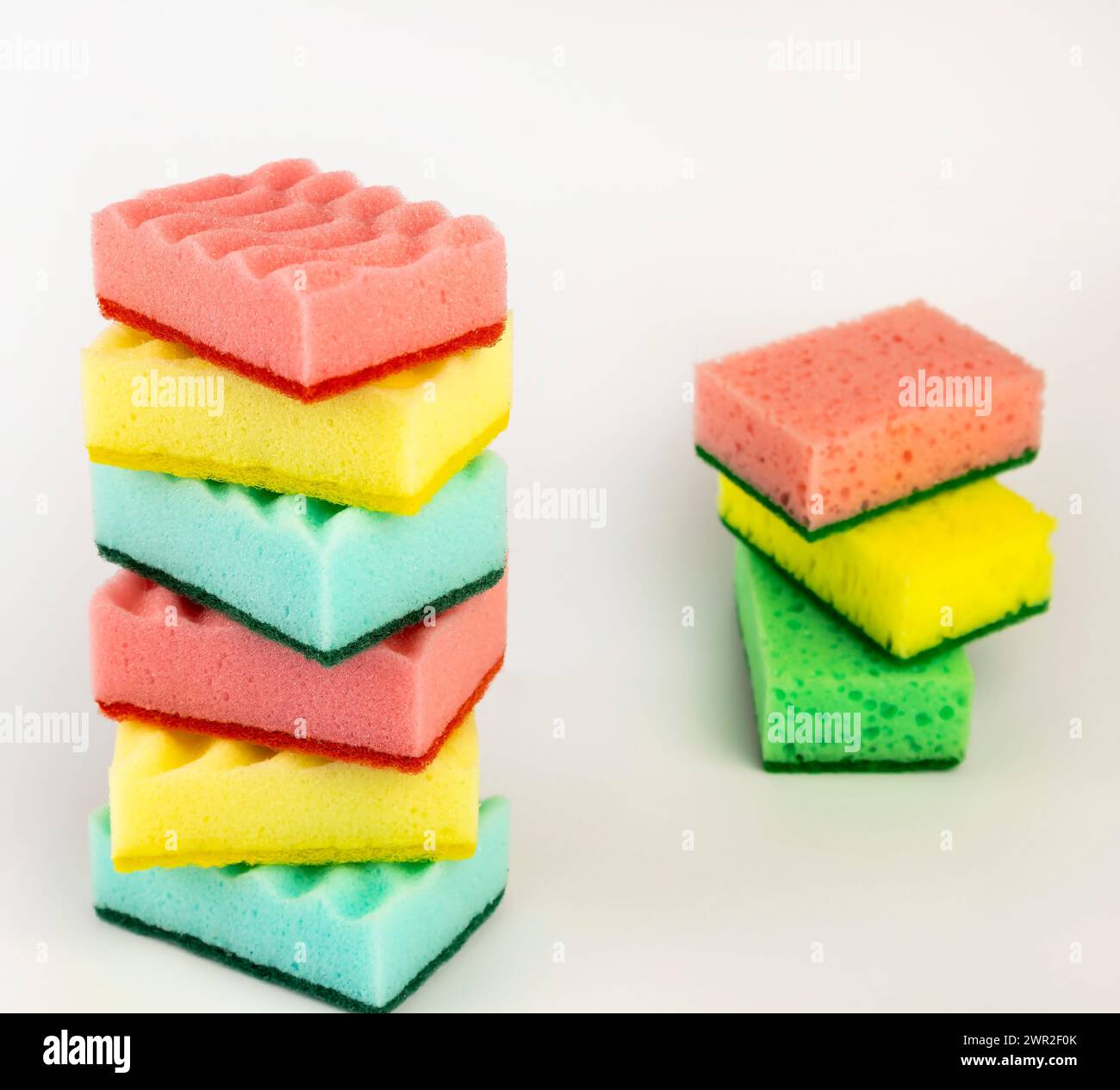Multi-colored sponges for washing dishes isolated on a white background ...