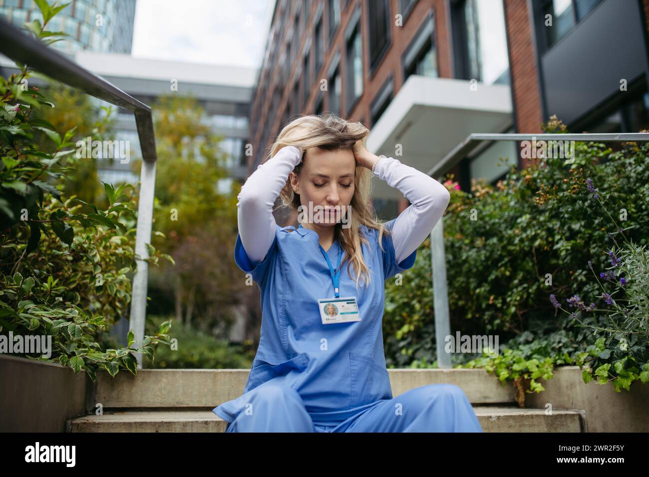 Exhausted nurse resting head hi-res stock photography and images - Alamy