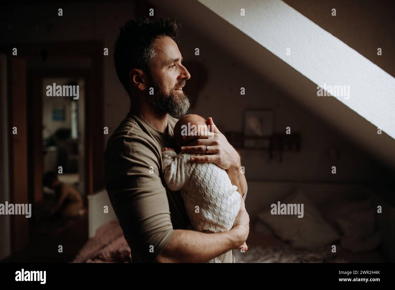 Father holding his newborn baby. Unconditional paternal love, Father's ...