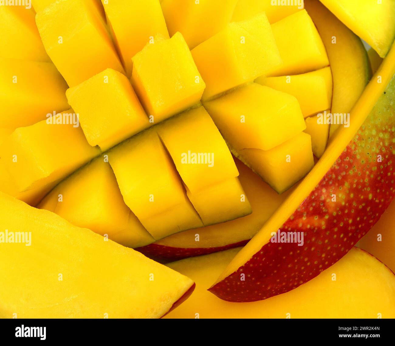 mango slice isolated on white background Stock Photo - Alamy