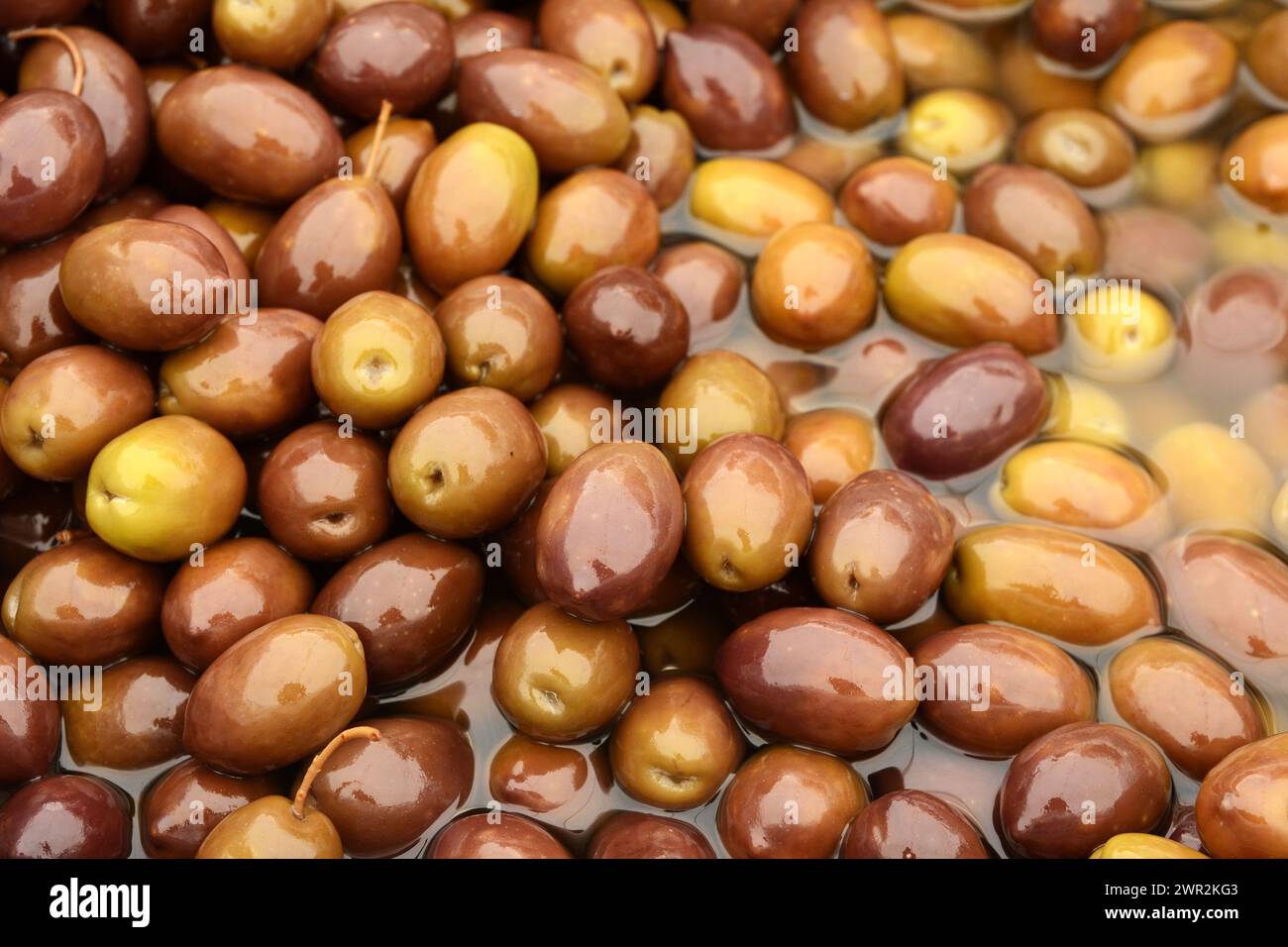 Olives at local market background Stock Photo - Alamy