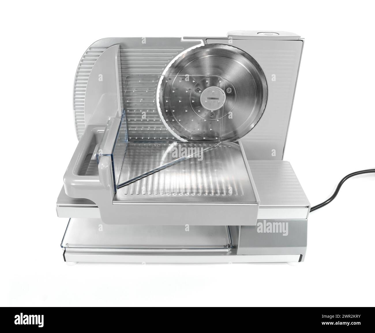 Ktchen food slicing machine isolated on white. Meat slicer for layered ...