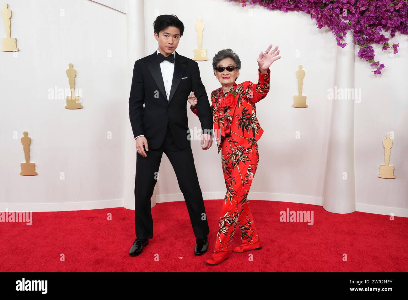 Sean Wang, left, and Chang Li Hua arrive at the Oscars on Sunday, March ...