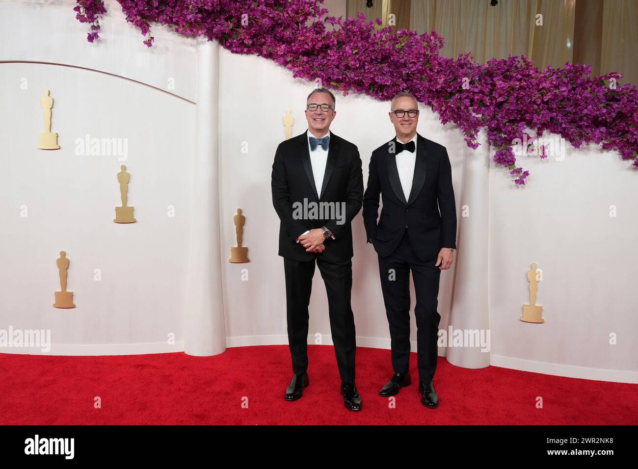 Bill Kramer, left, and Peter Cipkowski arrive at the Oscars on Sunday ...