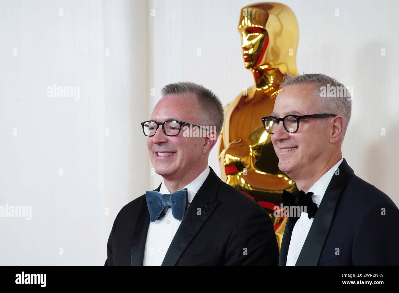 Bill Kramer, left, and Peter Cipkowski arrive at the Oscars on Sunday ...