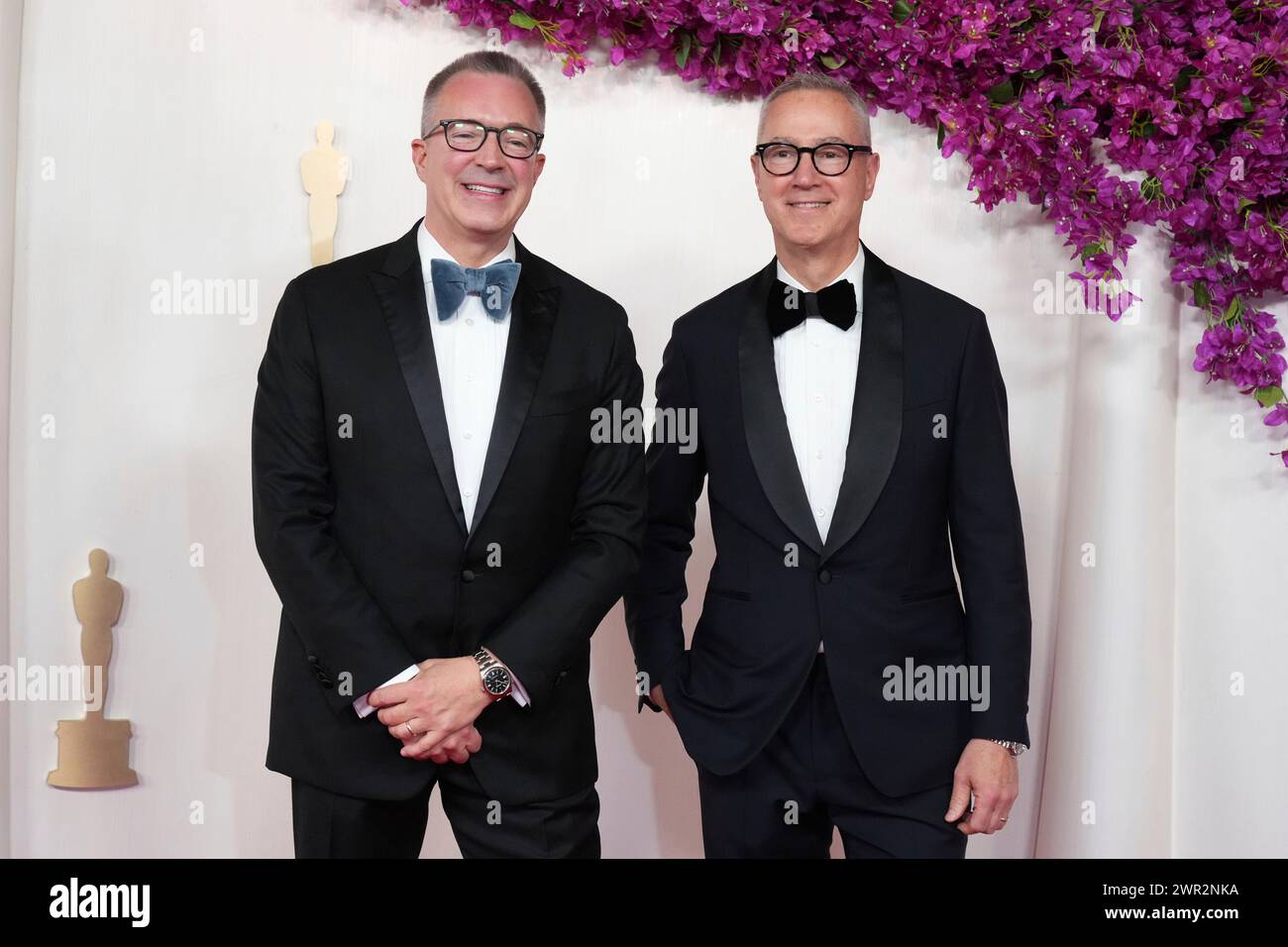 Bill Kramer, left, and Peter Cipkowski arrive at the Oscars on Sunday, March 10, 2024, at the ...
