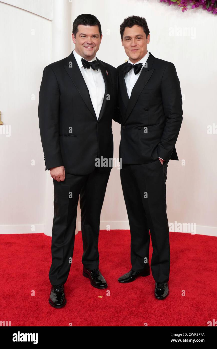 Christopher Miller, left, and Phil Lord arrive at the Oscars on Sunday ...