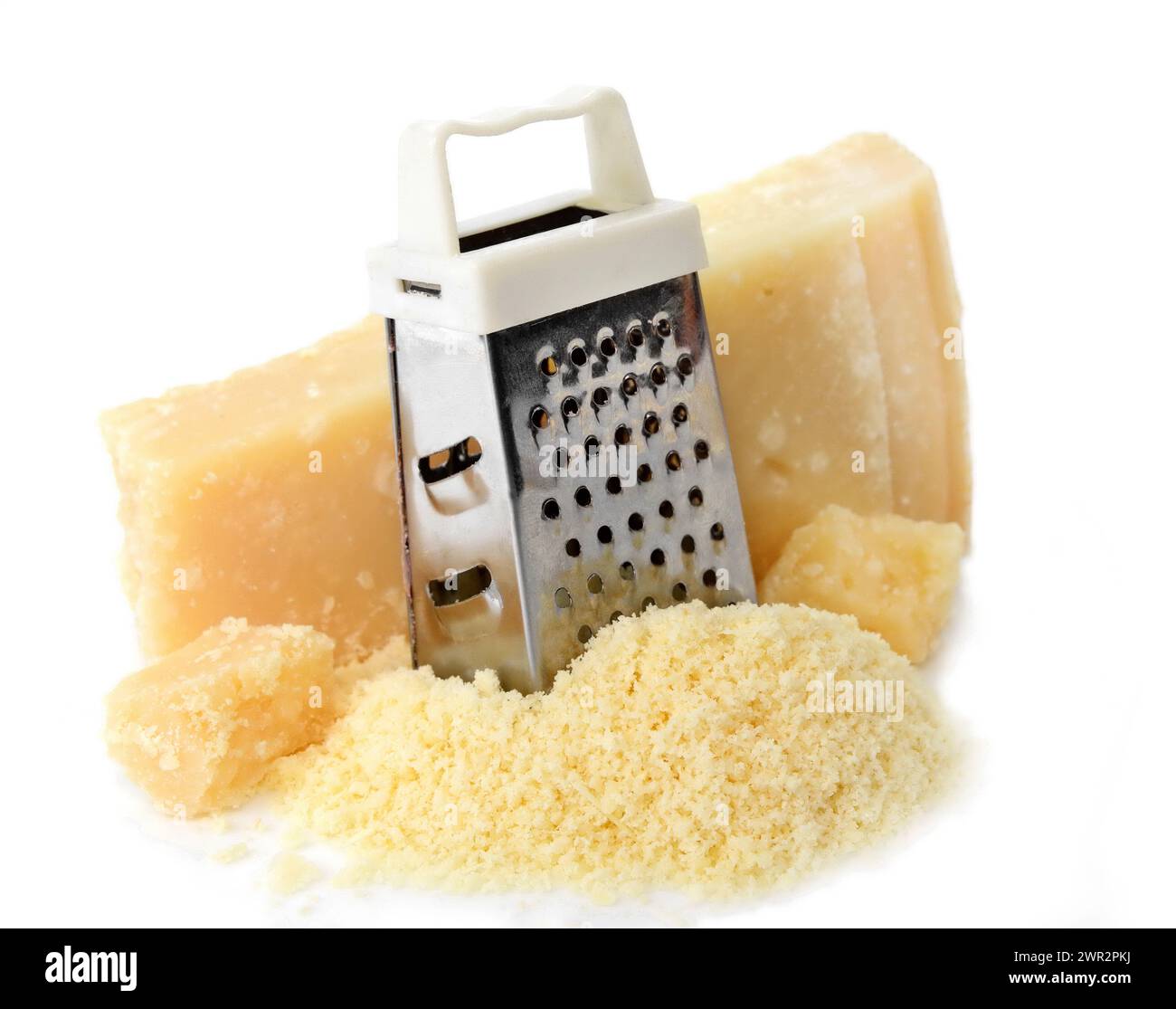 Grater and Parmigiano-Reggiano parmesan cheese composition isolated ...