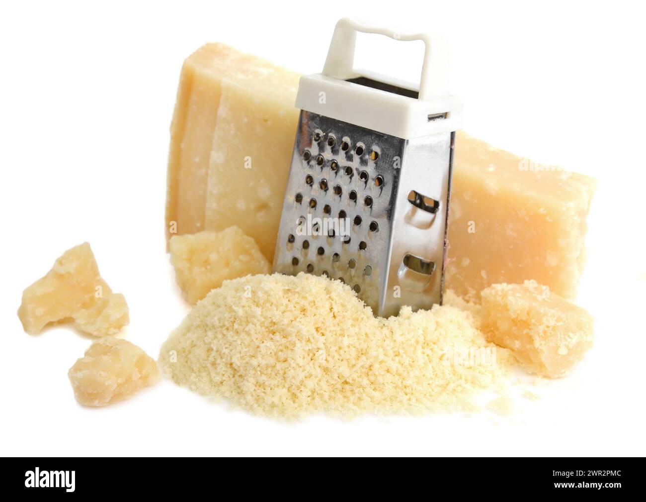 Grater and Parmigiano-Reggiano parmesan cheese composition isolated ...