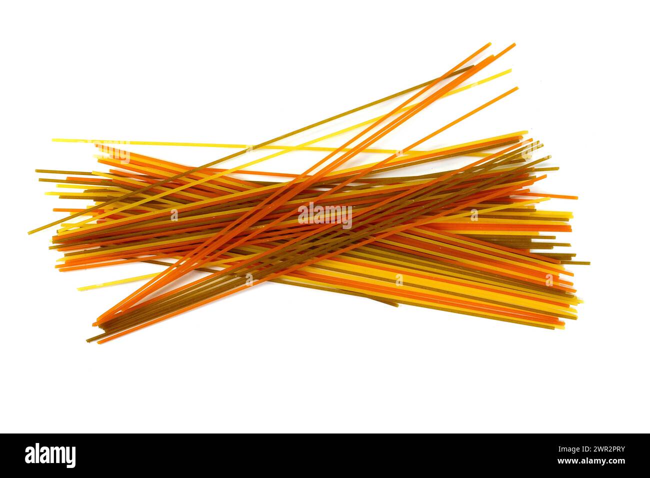 long multicolored pasta, flavoured spaghetti isolated on white ...