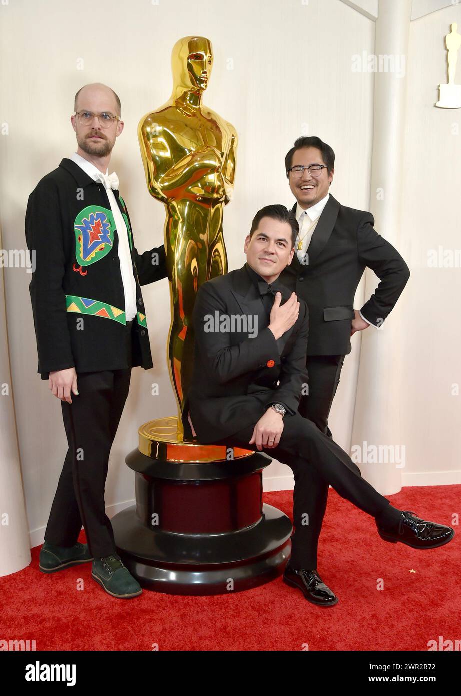 Daniel Scheinert, from left, Jonathan Wang and Daniel Kwan arrive at ...
