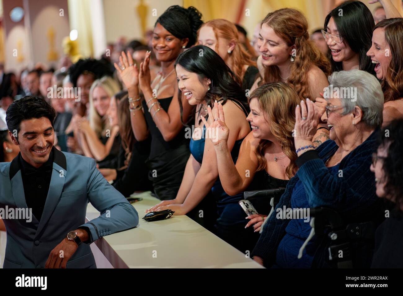 Taylor Zakhar Perez, left, arrives at the Oscars on Sunday, March 10 ...