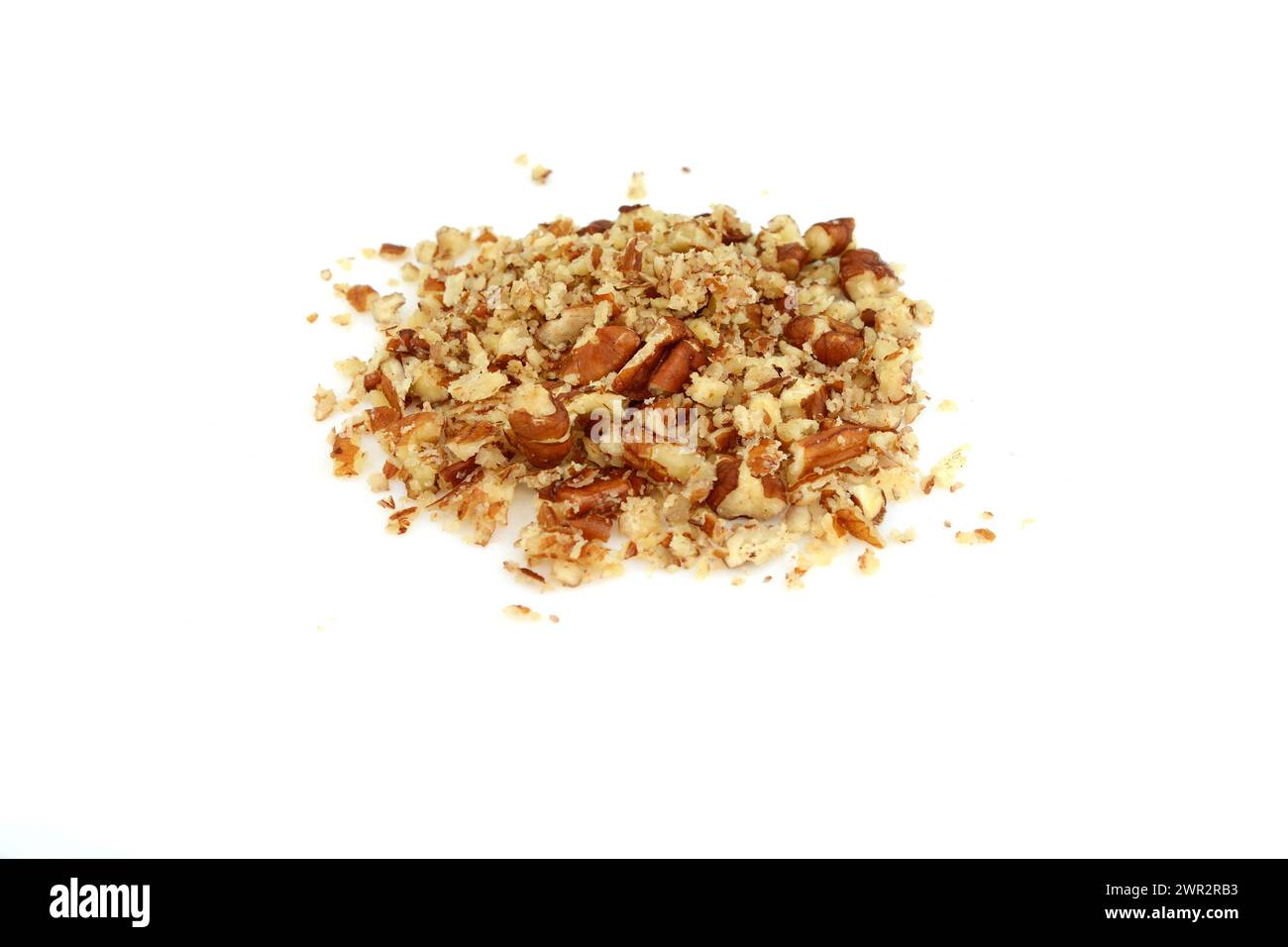 Ground, milled, crushed, Chopped pecan nuts isolated on white ...