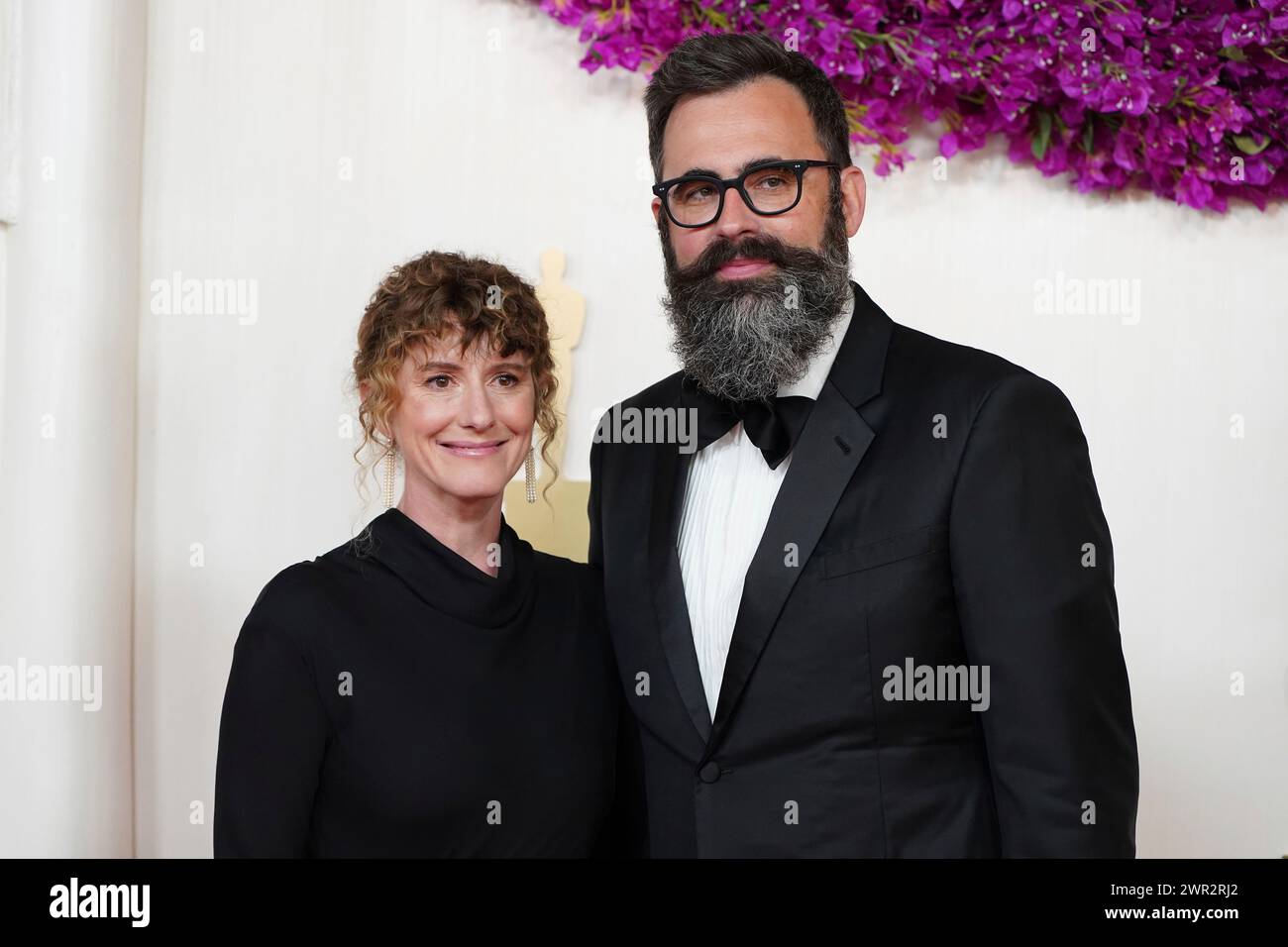 Jerusha Hess, left, and Jared Hess arrive at the Oscars on Sunday ...