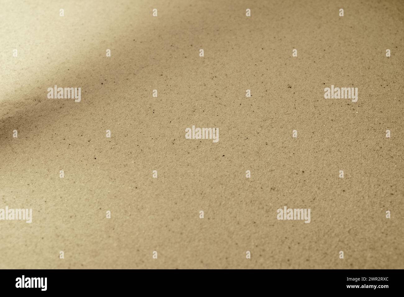 Shadows and patterns on the sand of dune. Sandy beach for the ...