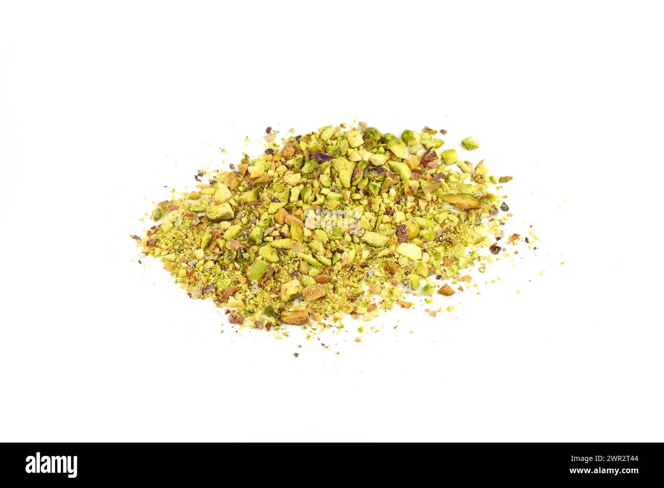 Ground, milled, crushed or granulated pistachio pile isolated on white ...