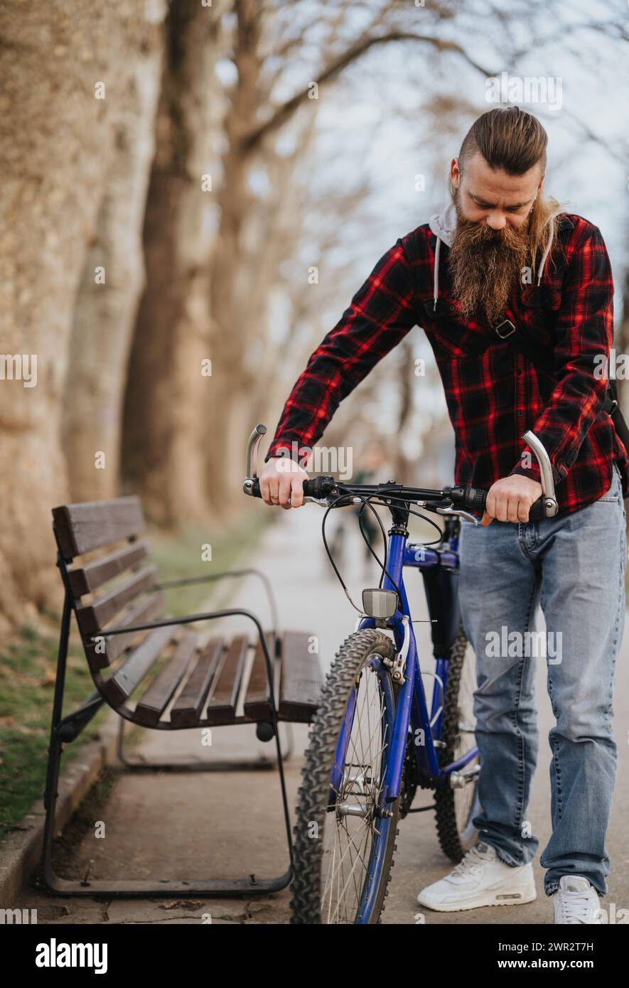 Bearded guy riding bicycle hi-res stock photography and images - Alamy
