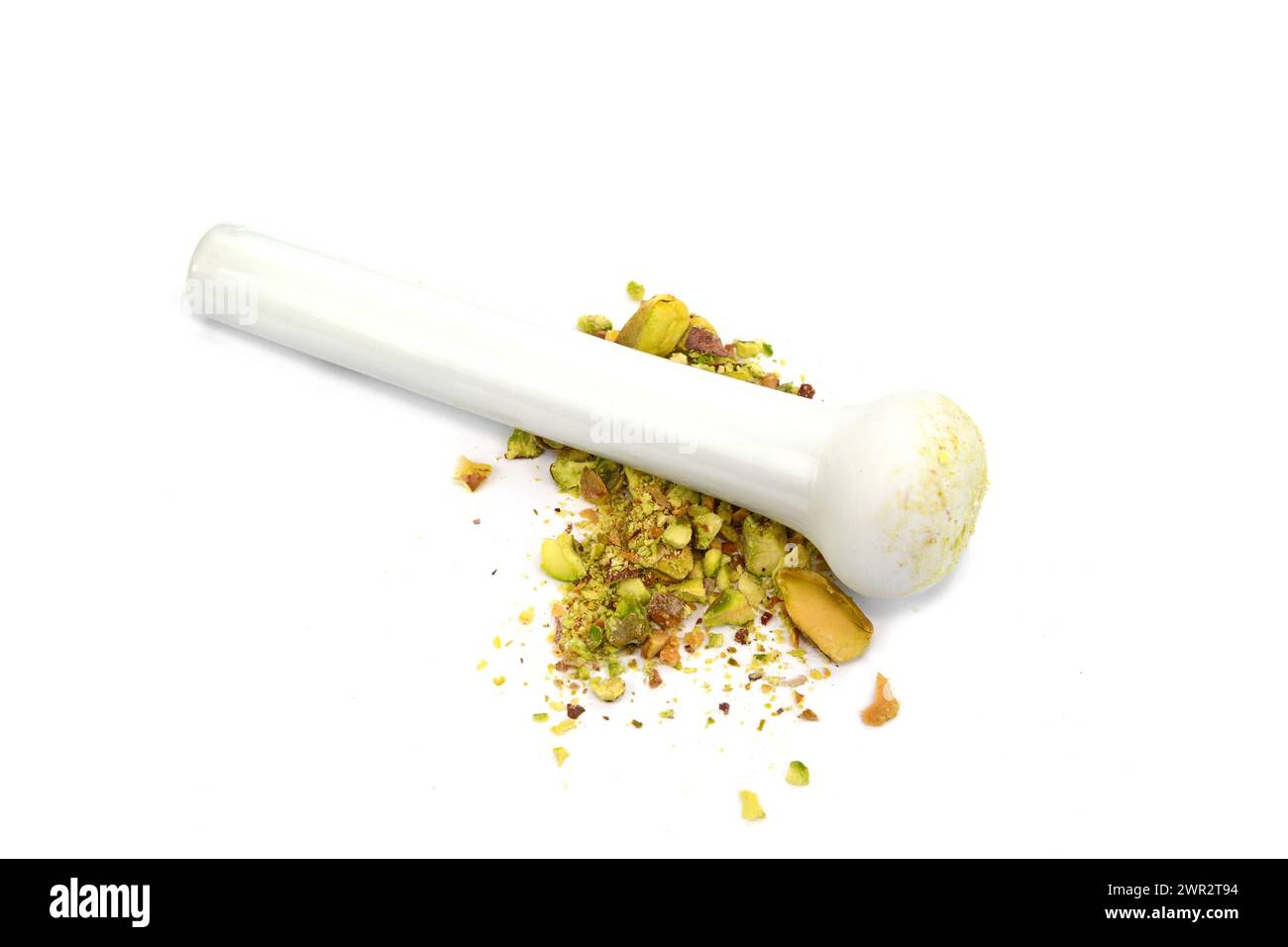 Ground, milled, crushed or granulated pistachio pile isolated on white ...