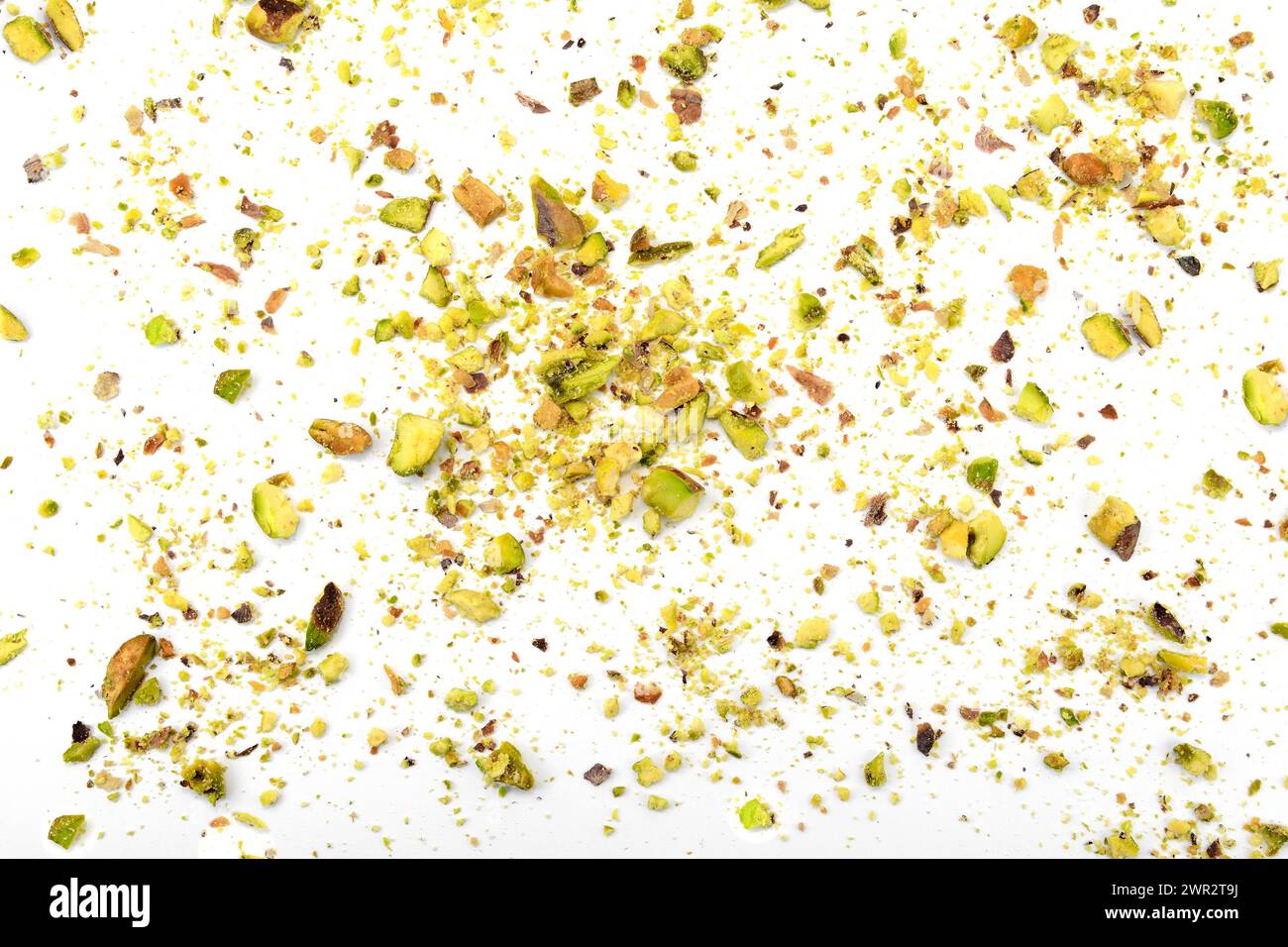 Ground, milled, crushed or granulated pistachio pile isolated on white ...