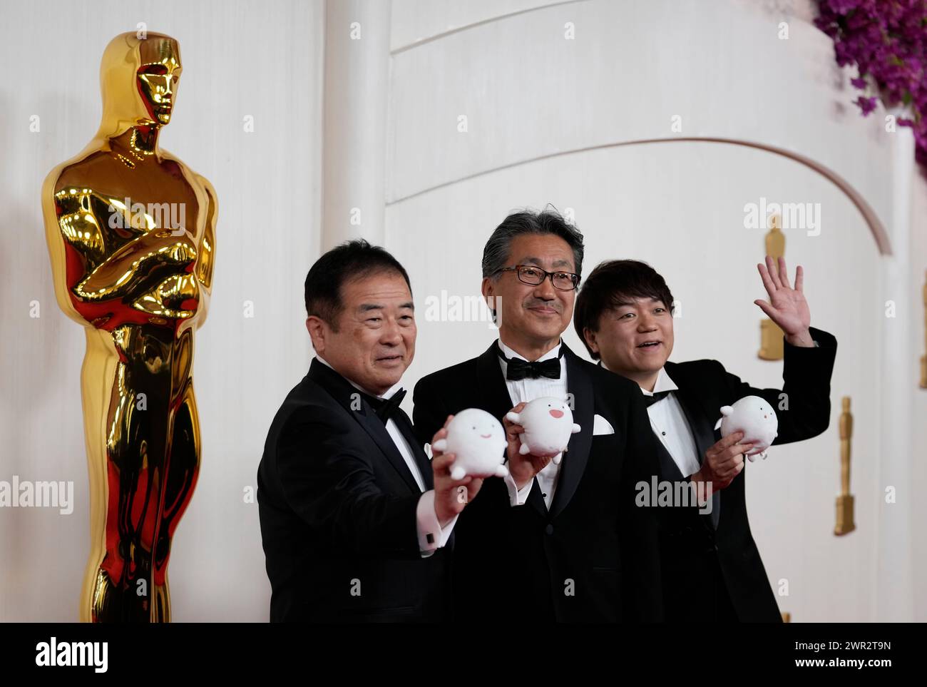 Hiroyuki Fukuda, from left, Kiyofumi Nakajima and Kenichi Yoda arrive ...