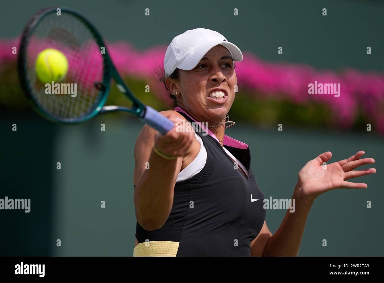 Madison Keys, of the United States, returns a shot against Yulia ...