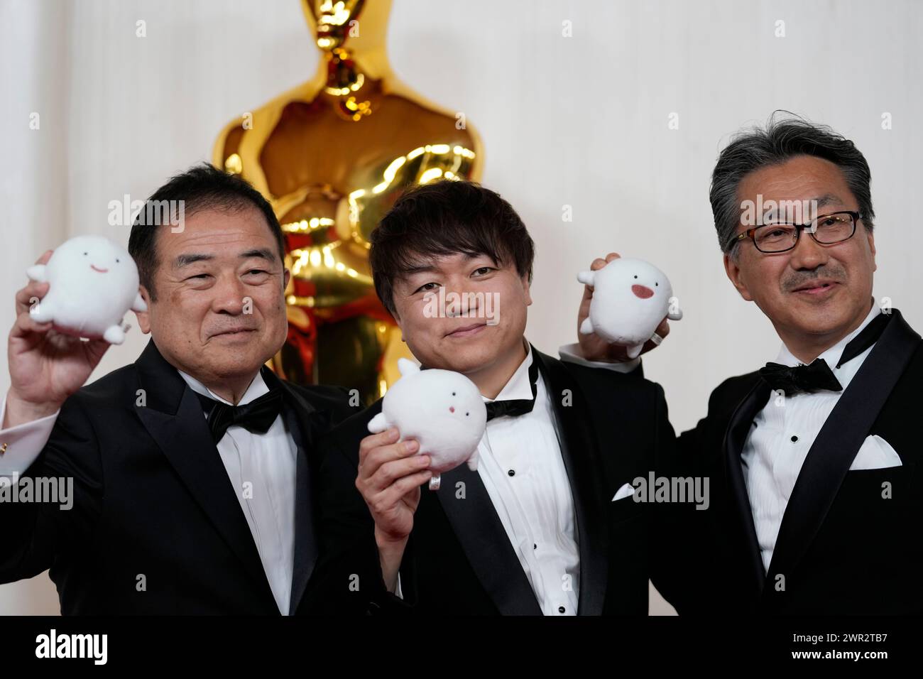Hiroyuki Fukuda, from left, Kenichi Yoda and Kiyofumi Nakajima arrive ...