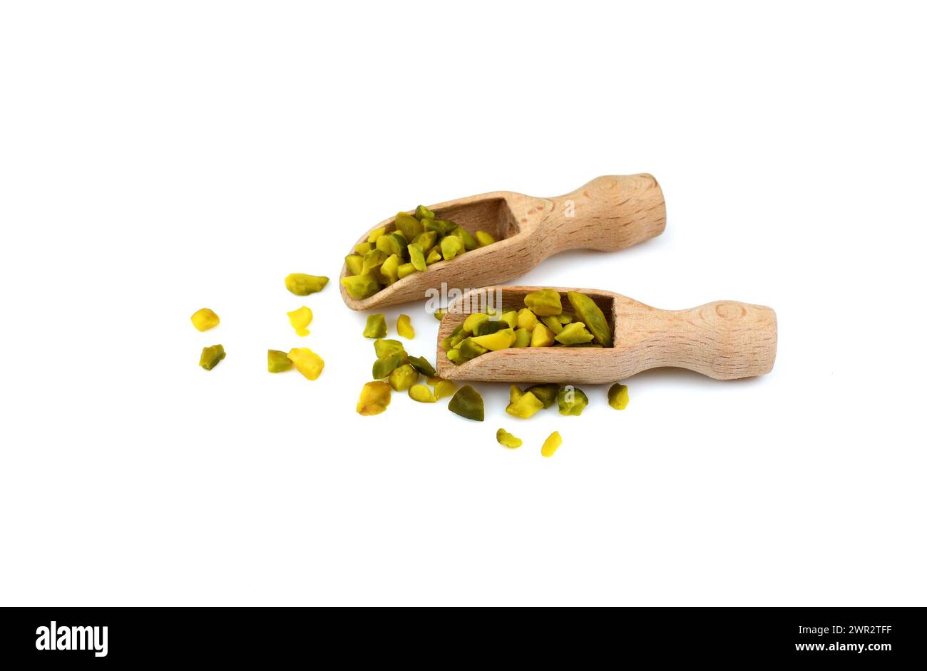 Ground, milled, crushed or granulated pistachio pile isolated on white ...