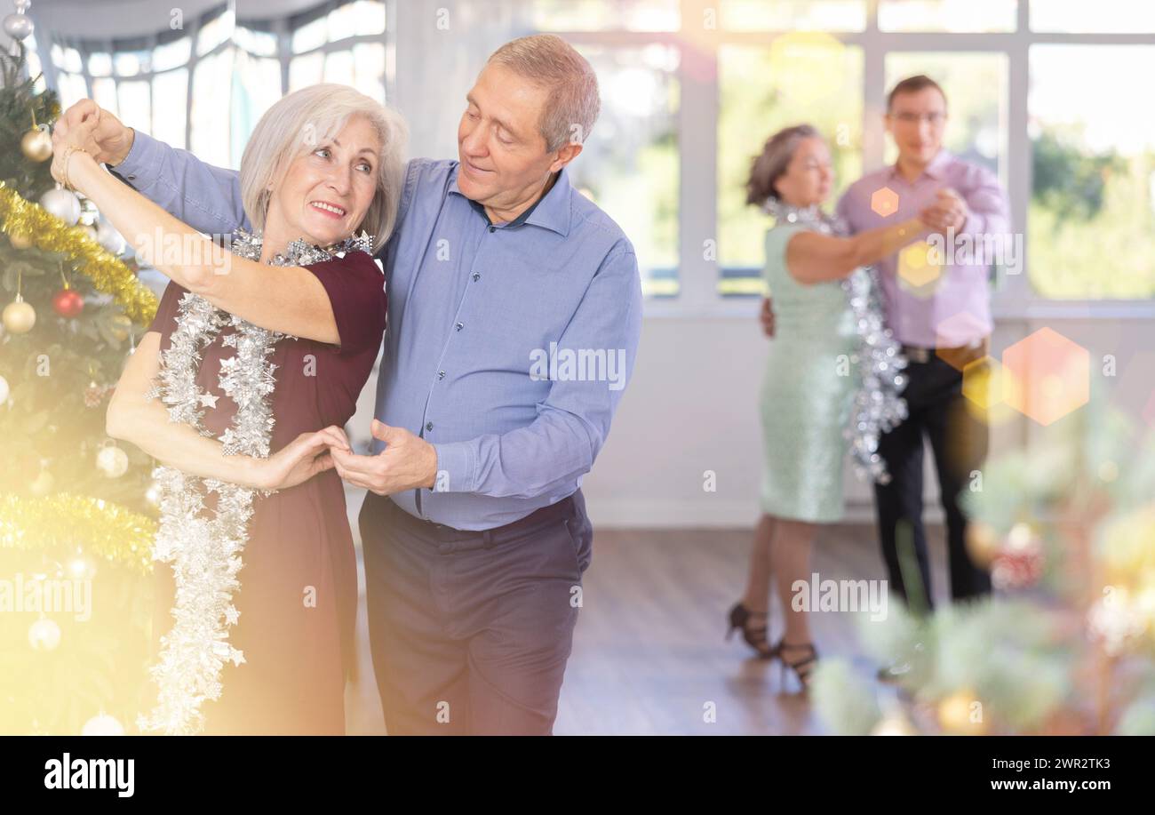 Elderly man and elderly woman dance waltz Stock Photo - Alamy