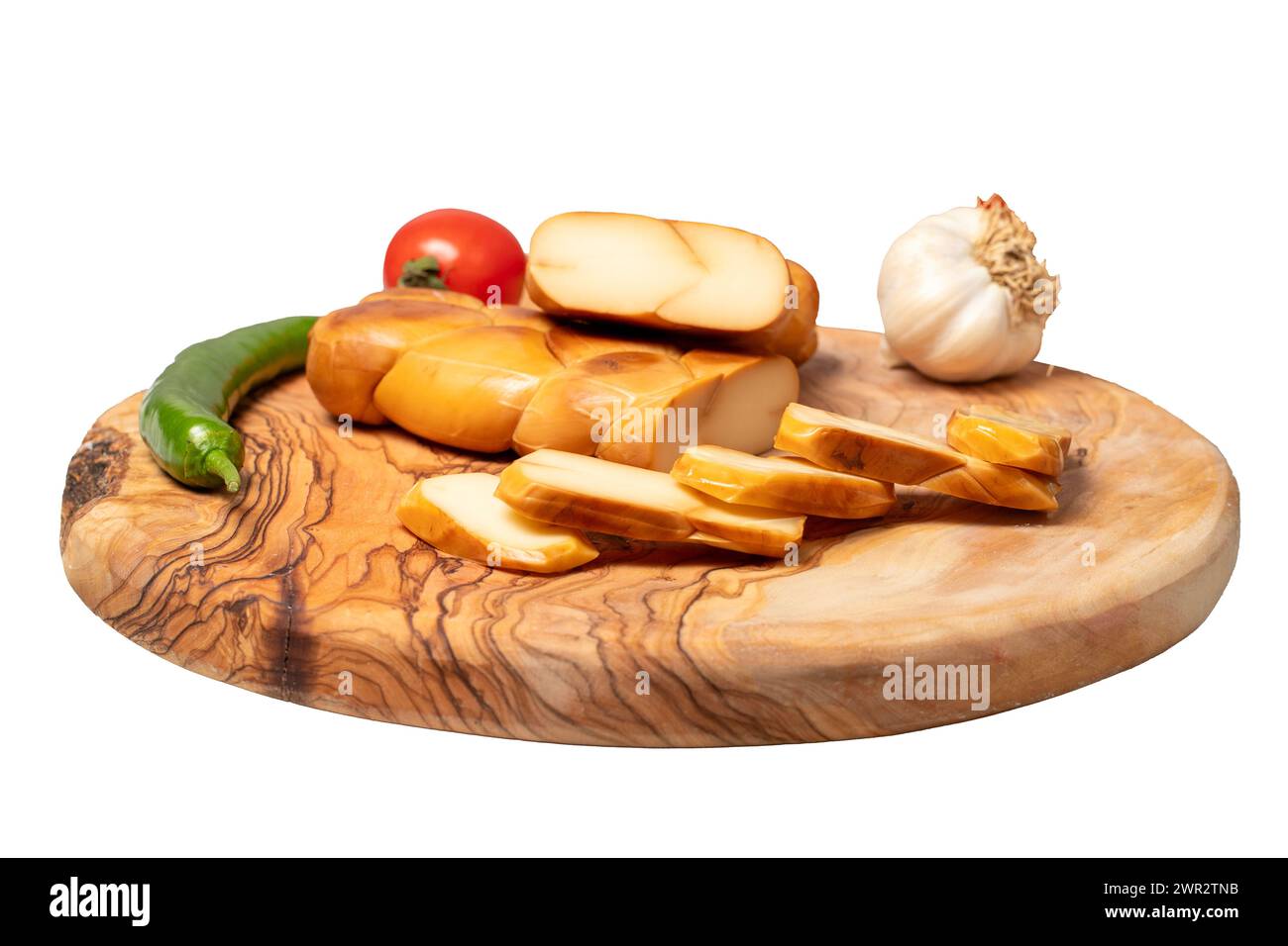 Smoked Circassian cheese. Smoked Circassian cheese on a cutting board ...