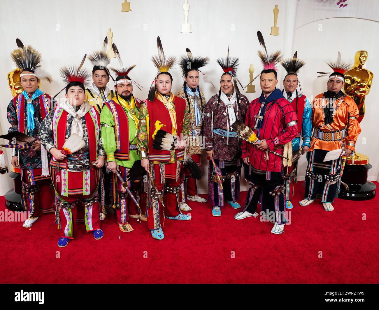 Los Angeles, USA. 10th Mar, 2024. Osage dancers and performers walking ...
