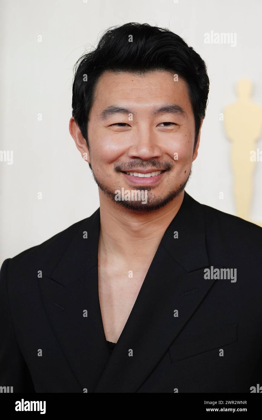 Simu Liu arrives at the Oscars on Sunday, March 10, 2024, at the Dolby ...