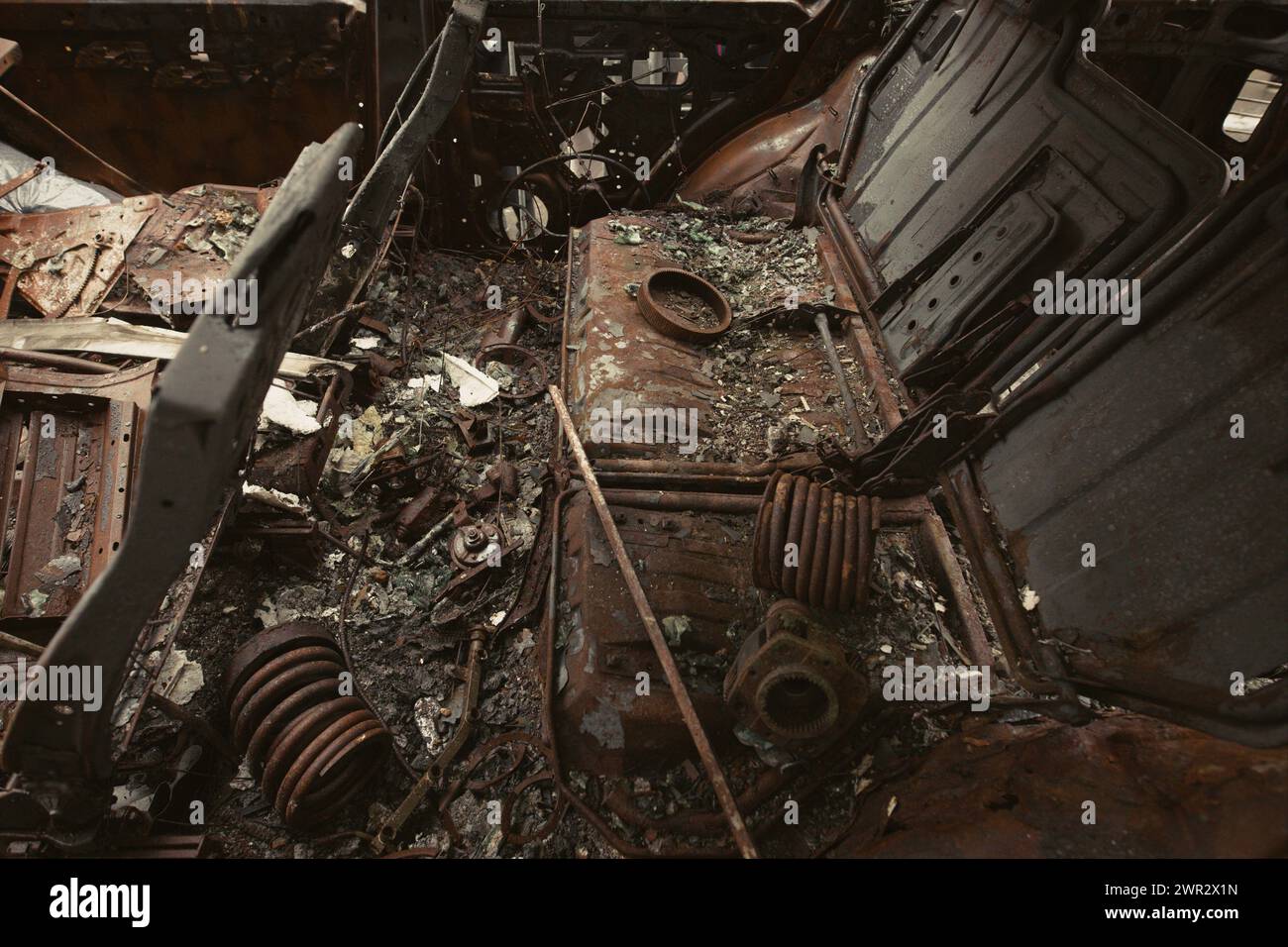 Totaly burned debris of vehicle absolutely damaged by fire Stock Photo ...