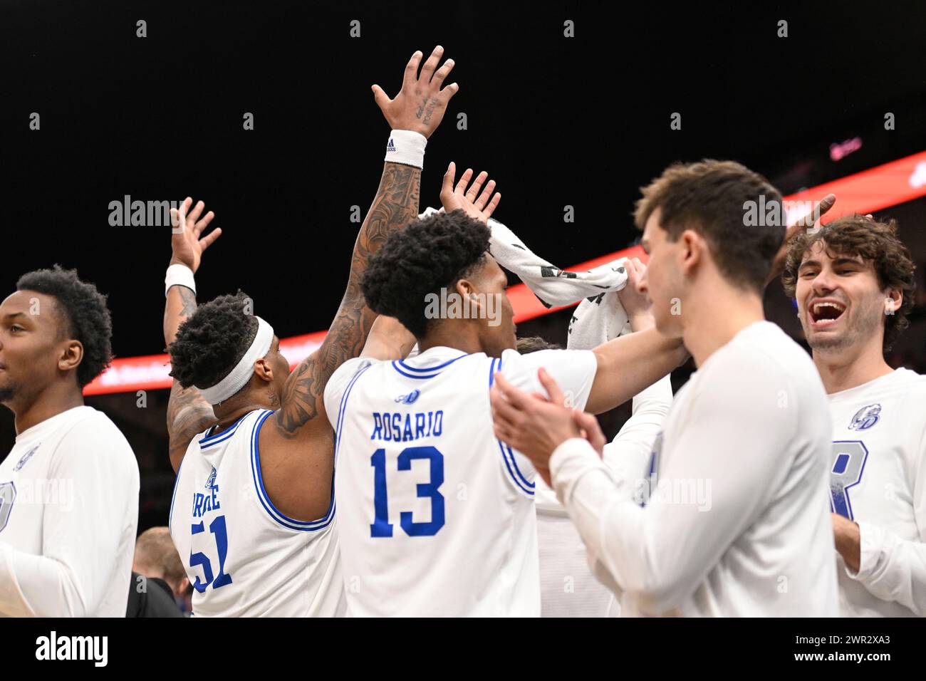 Members of Drake react after beating Indiana State 84-80 after the ...