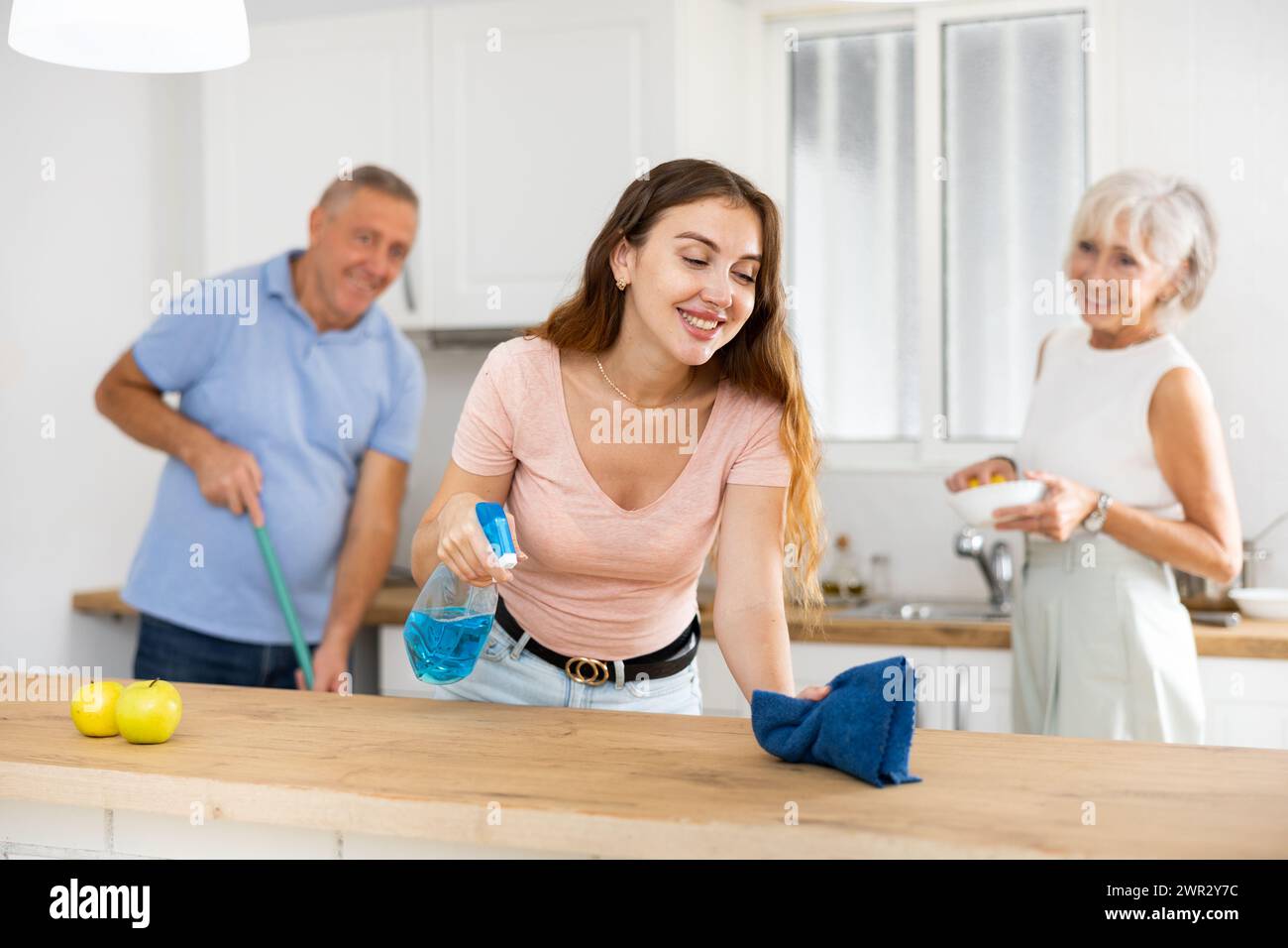 Happy moment of family when cleaning the kitchen with happiness Stock ...