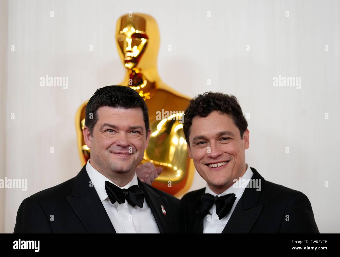 Christopher Miller, left, and Phil Lord arrive at the Oscars on Sunday ...