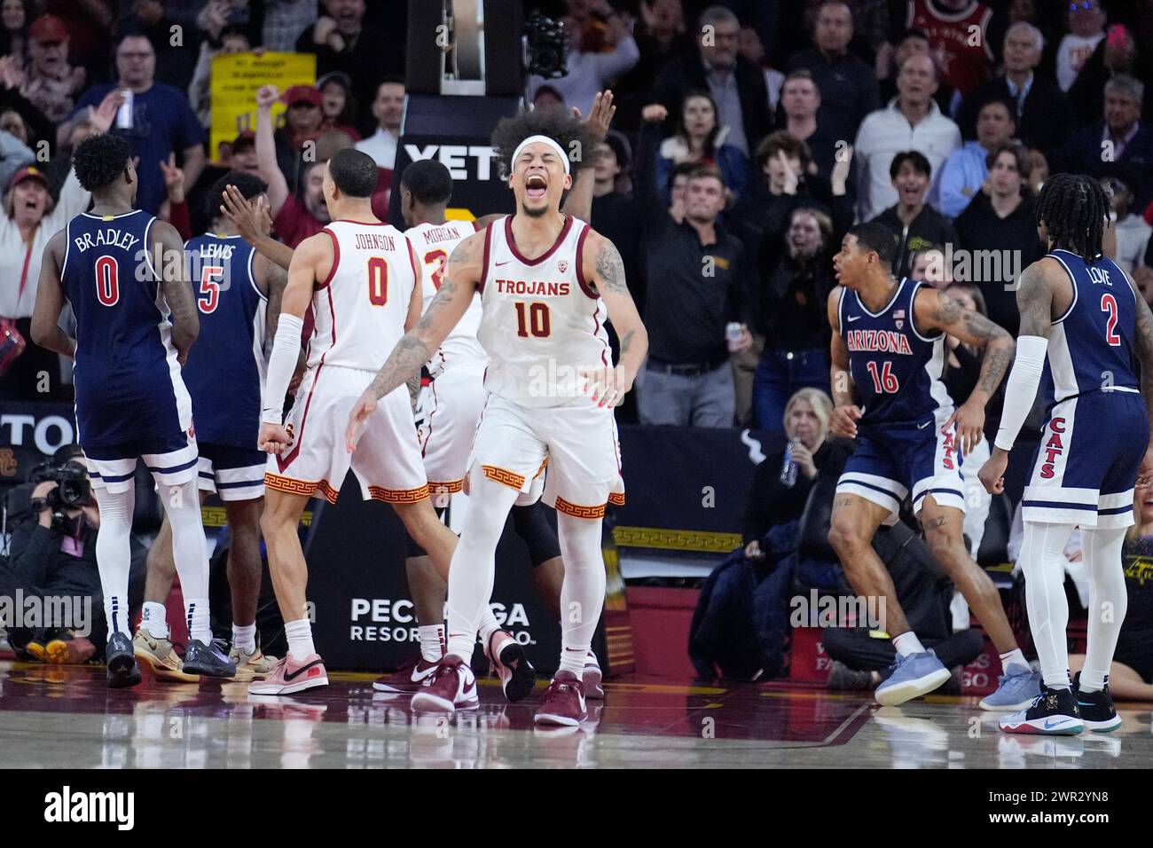 Southern California forward DJ Rodman (10) celebrates after taking a ...