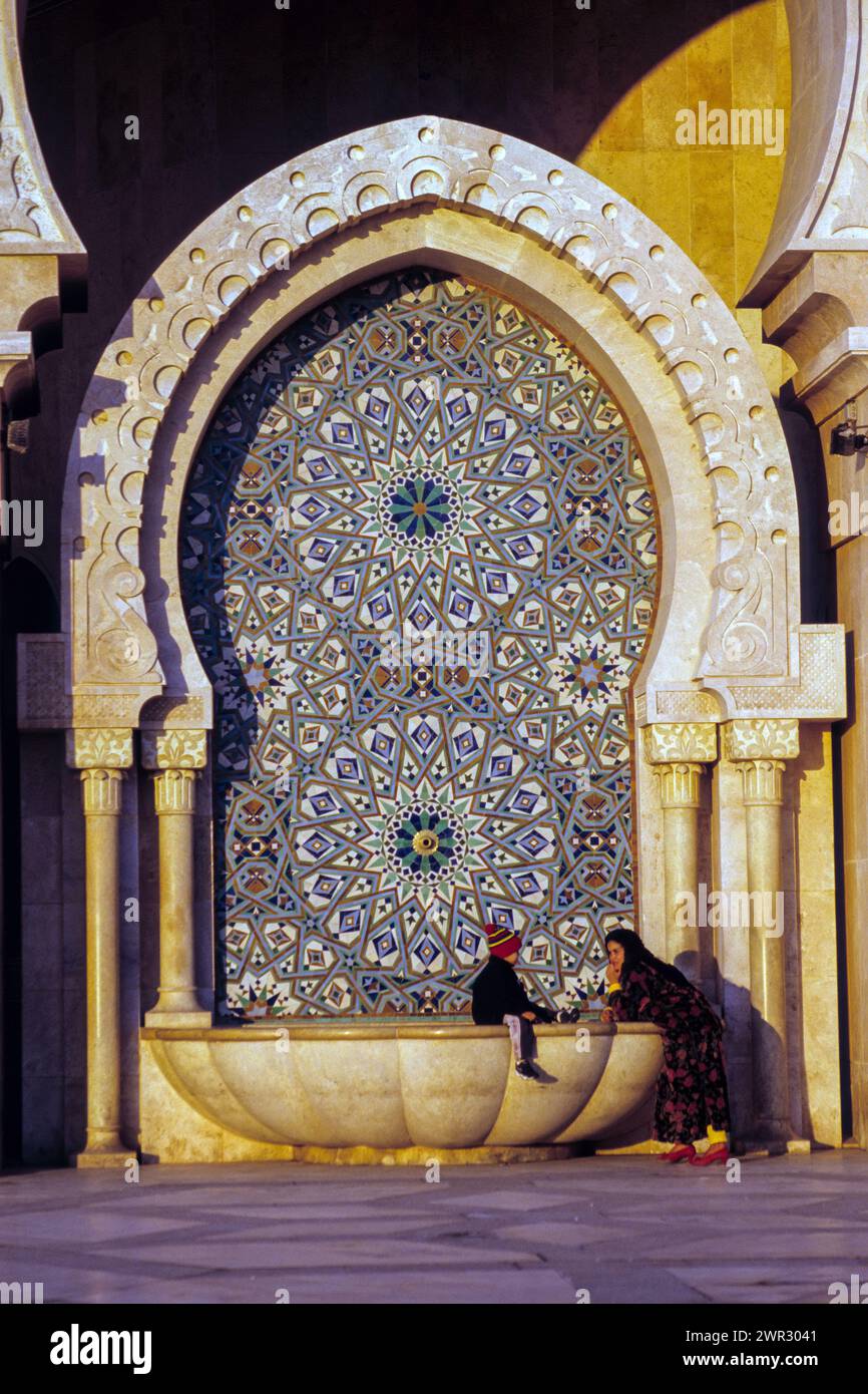 Casablanca, Morocco. Mother and Son at a Fountain at the Hassan II ...