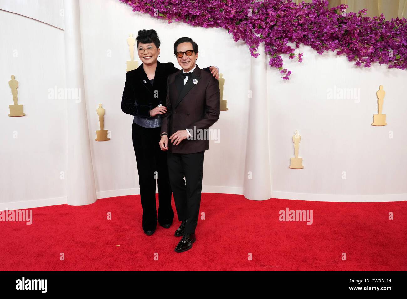 Echo Quan, left, and Ke Huy Quan arrive at the Oscars on Sunday, March ...
