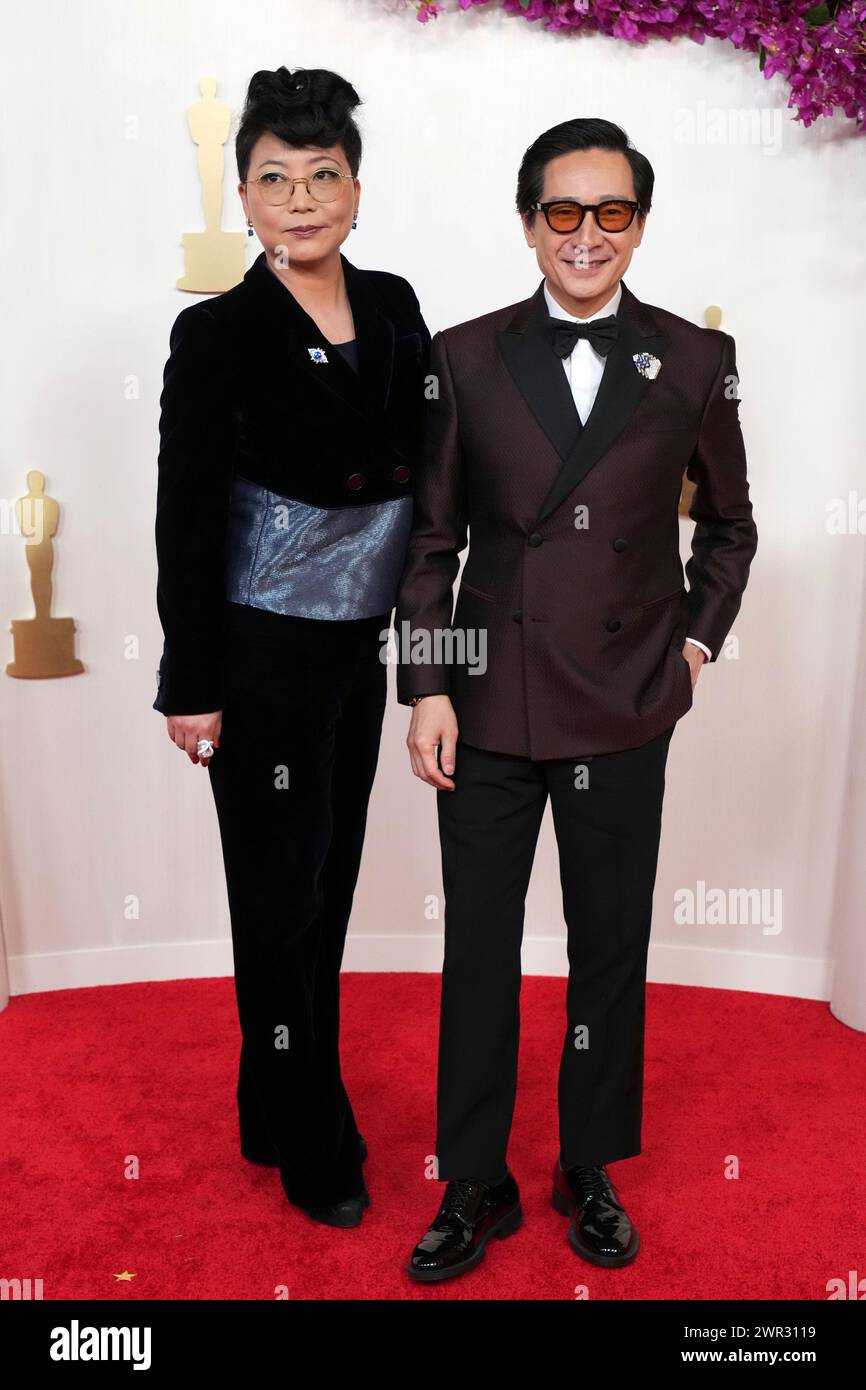 Echo Quan, left, and Ke Huy Quan arrive at the Oscars on Sunday, March ...