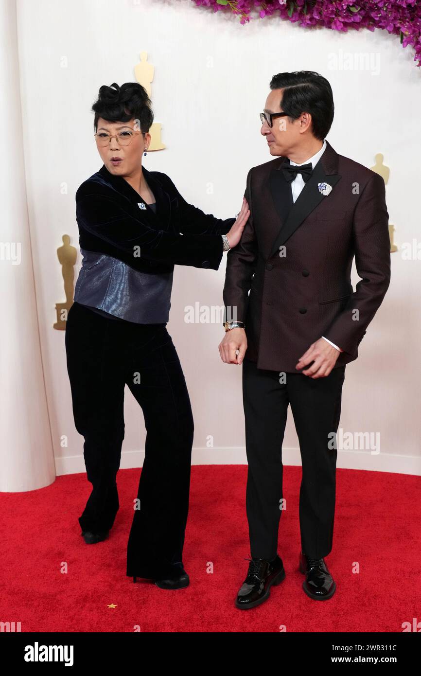 Echo Quan, left, and Ke Huy Quan arrive at the Oscars on Sunday, March ...
