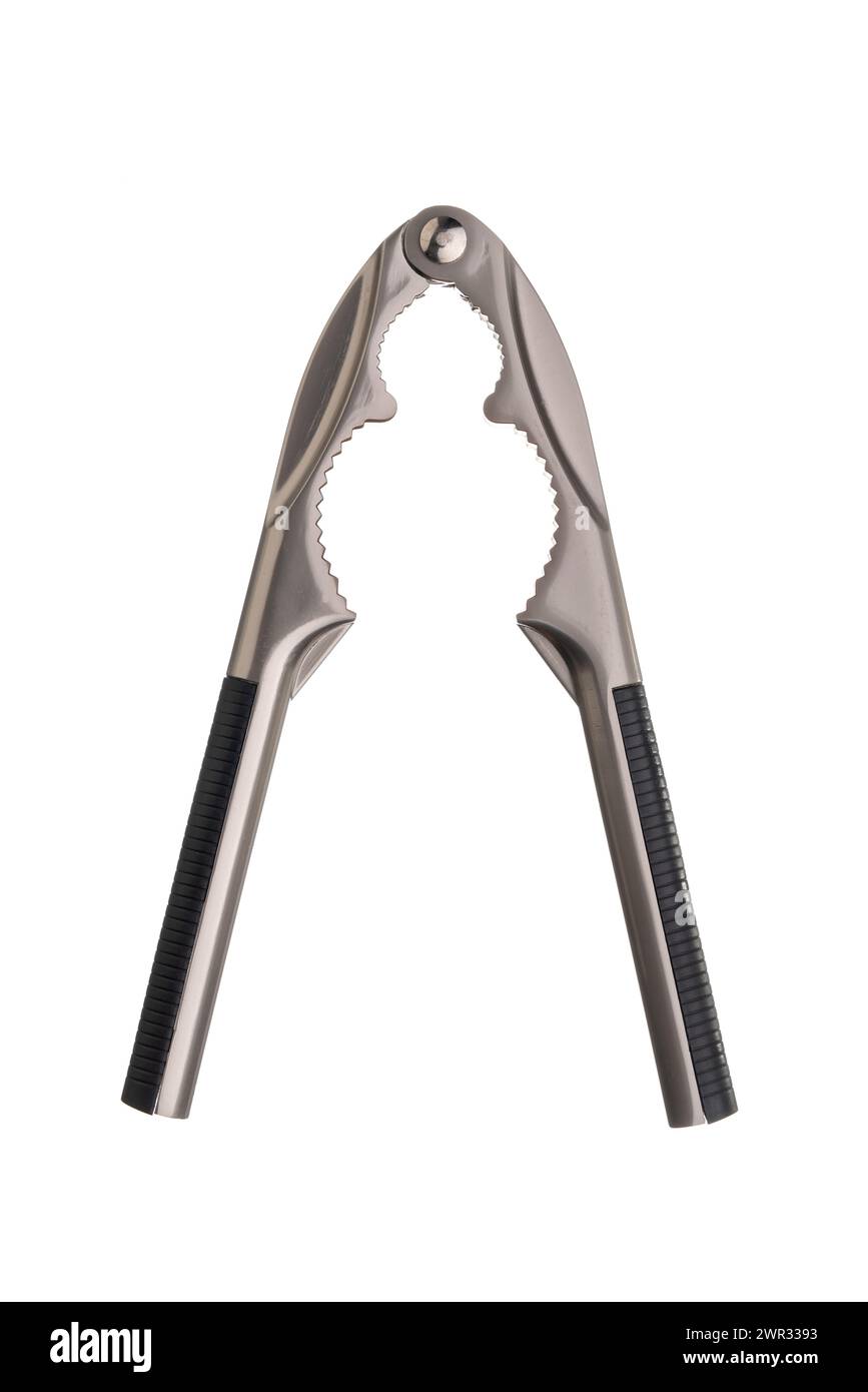 Metal nut cracker tongs for opening nuts isolated on white background ...