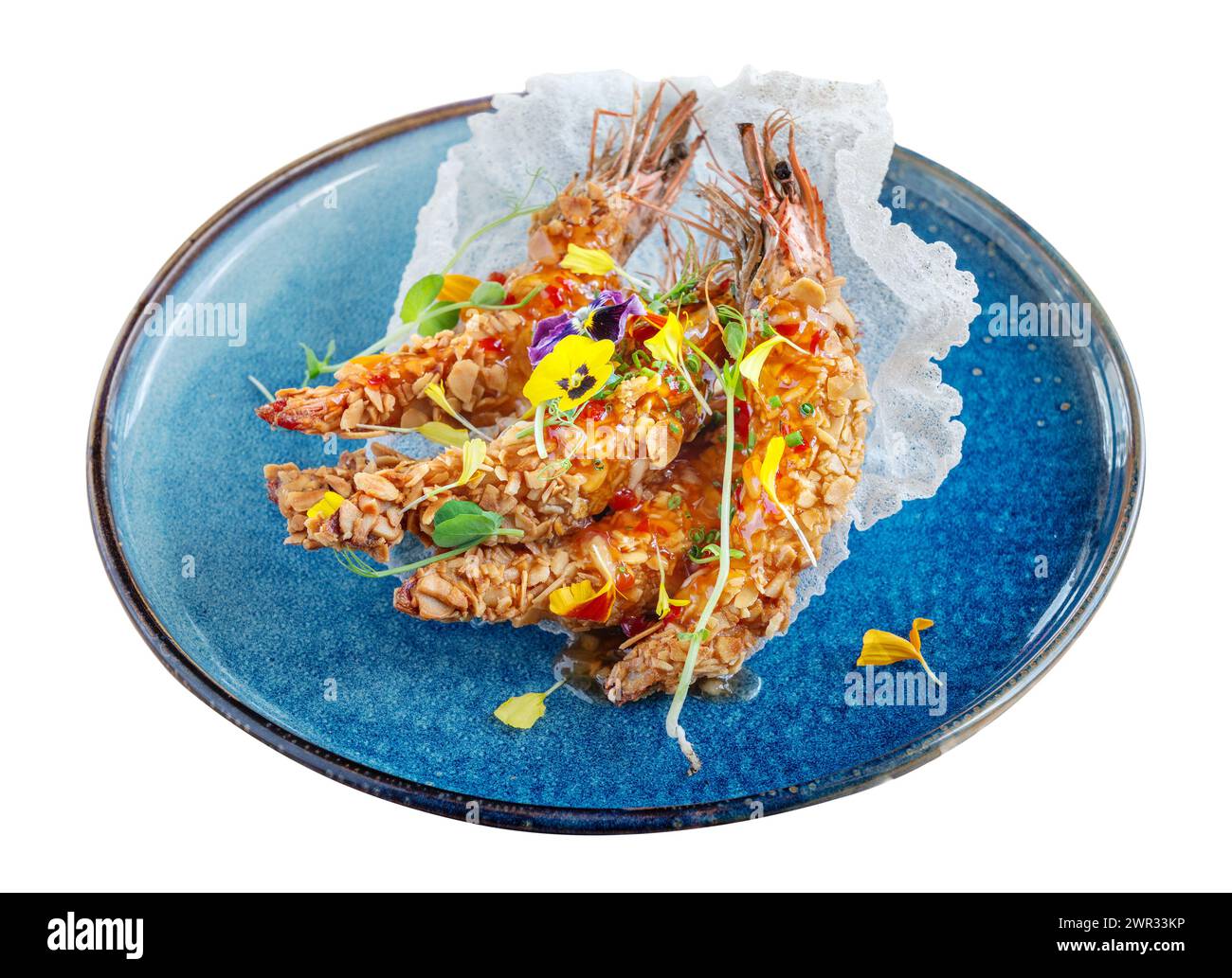 Exotic sea dish tiger squid shrimp fried in peanuts in a plate ...