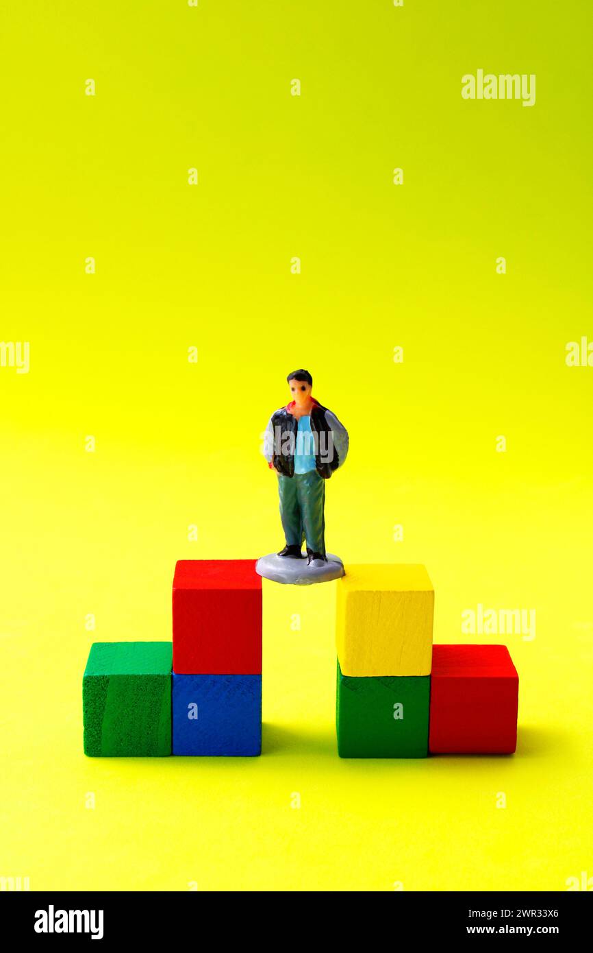Man standing between cubes despite the distance between them Stock ...