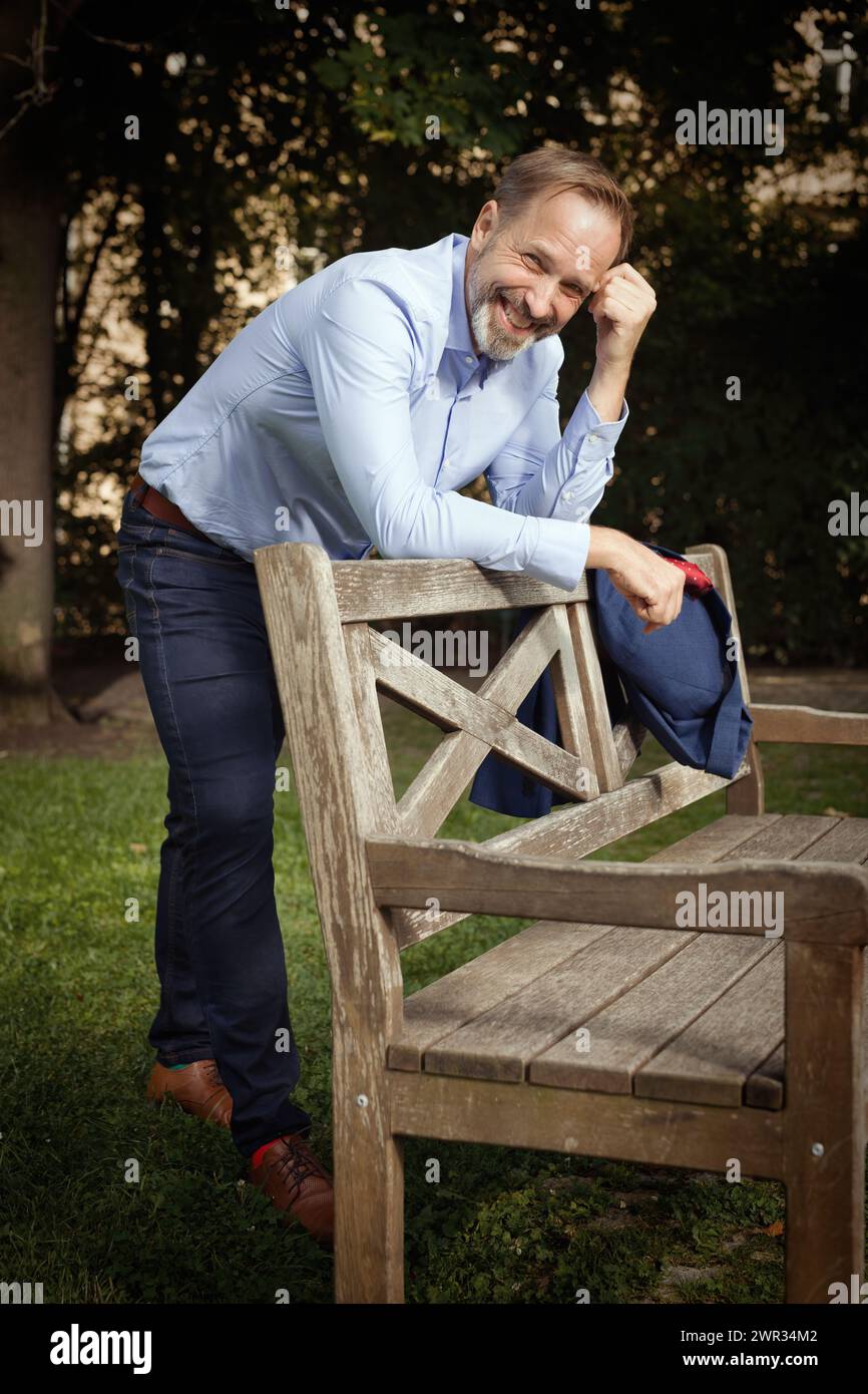 Male model posing on bench hi-res stock photography and images - Alamy