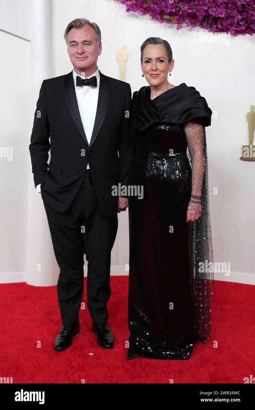 Christopher Nolan, left, and Emma Thomas arrive at the Oscars on Sunday ...