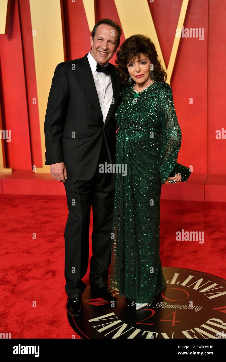 Percy Gibson, left, and Joan Collins arrive at the Vanity Fair Oscar ...