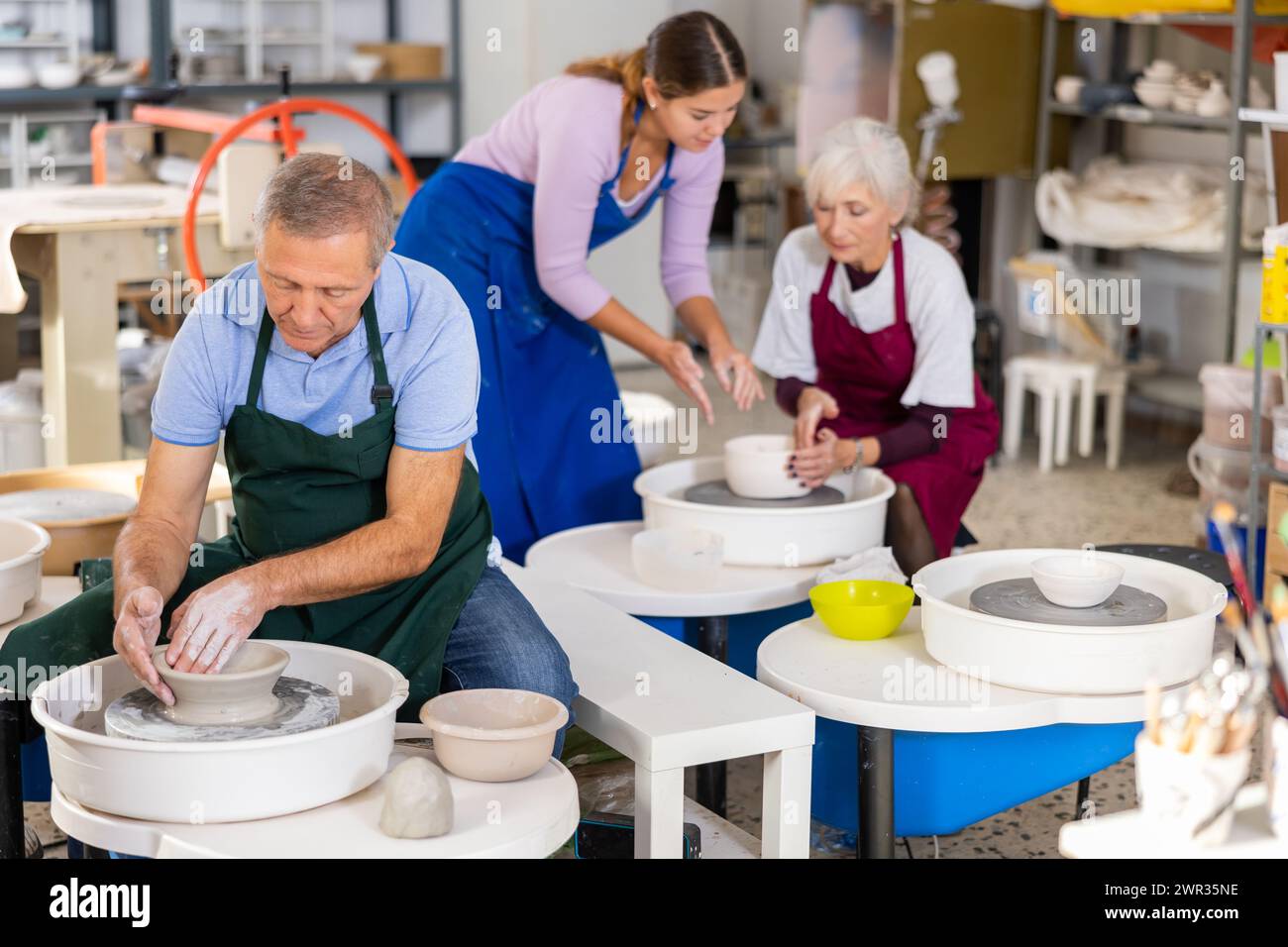 Artisan works on piece pottery hi-res stock photography and images - Alamy