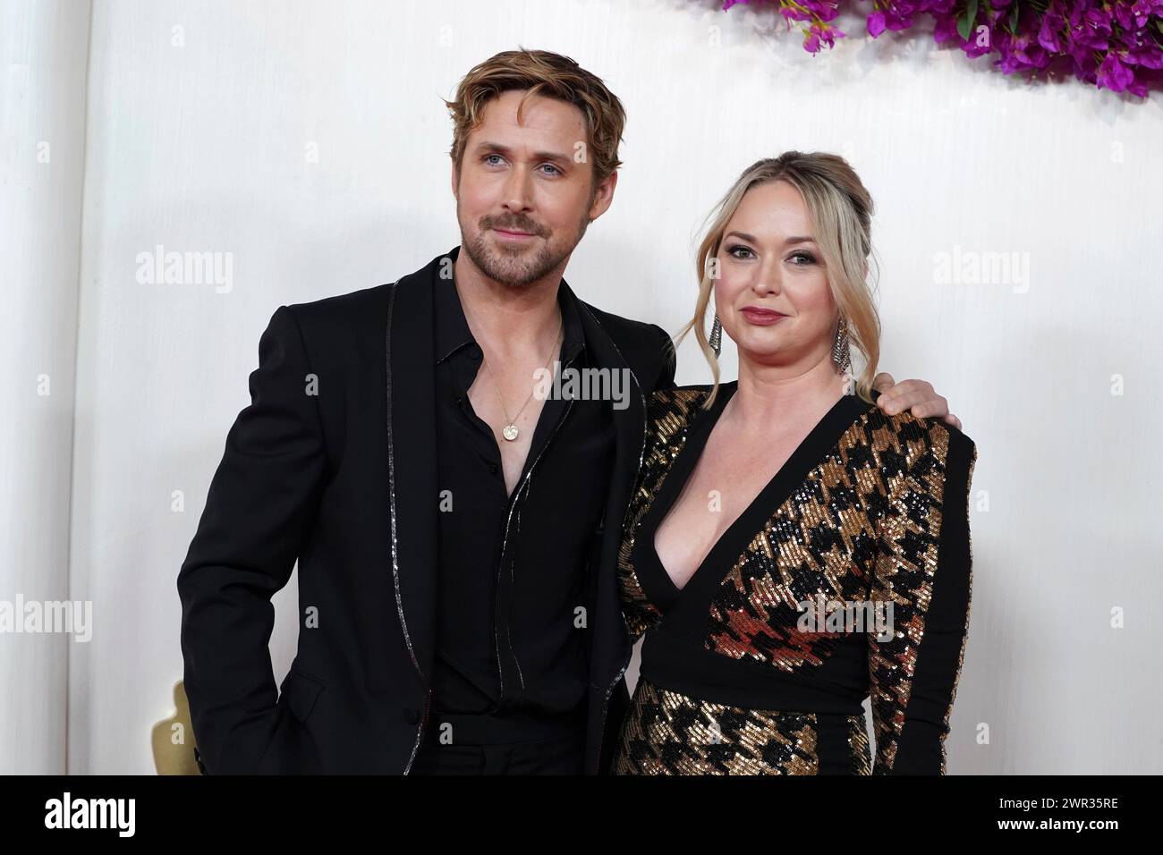 Ryan Gosling, left, and Mandi Gosling arrive at the Oscars on Sunday ...