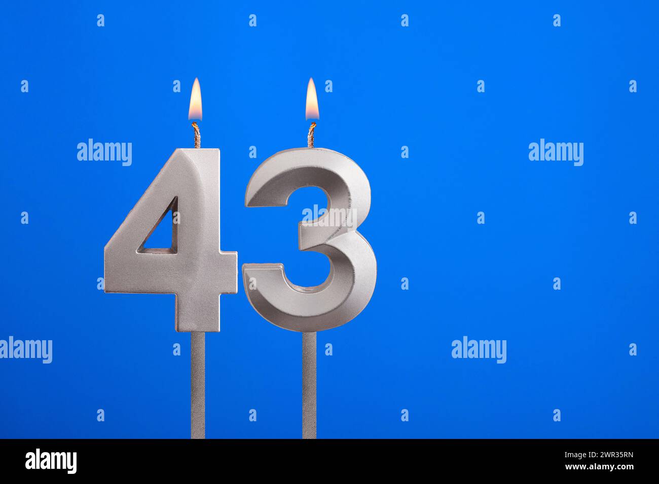 Birthday candle number 43 - Celebration card on blue background Stock ...