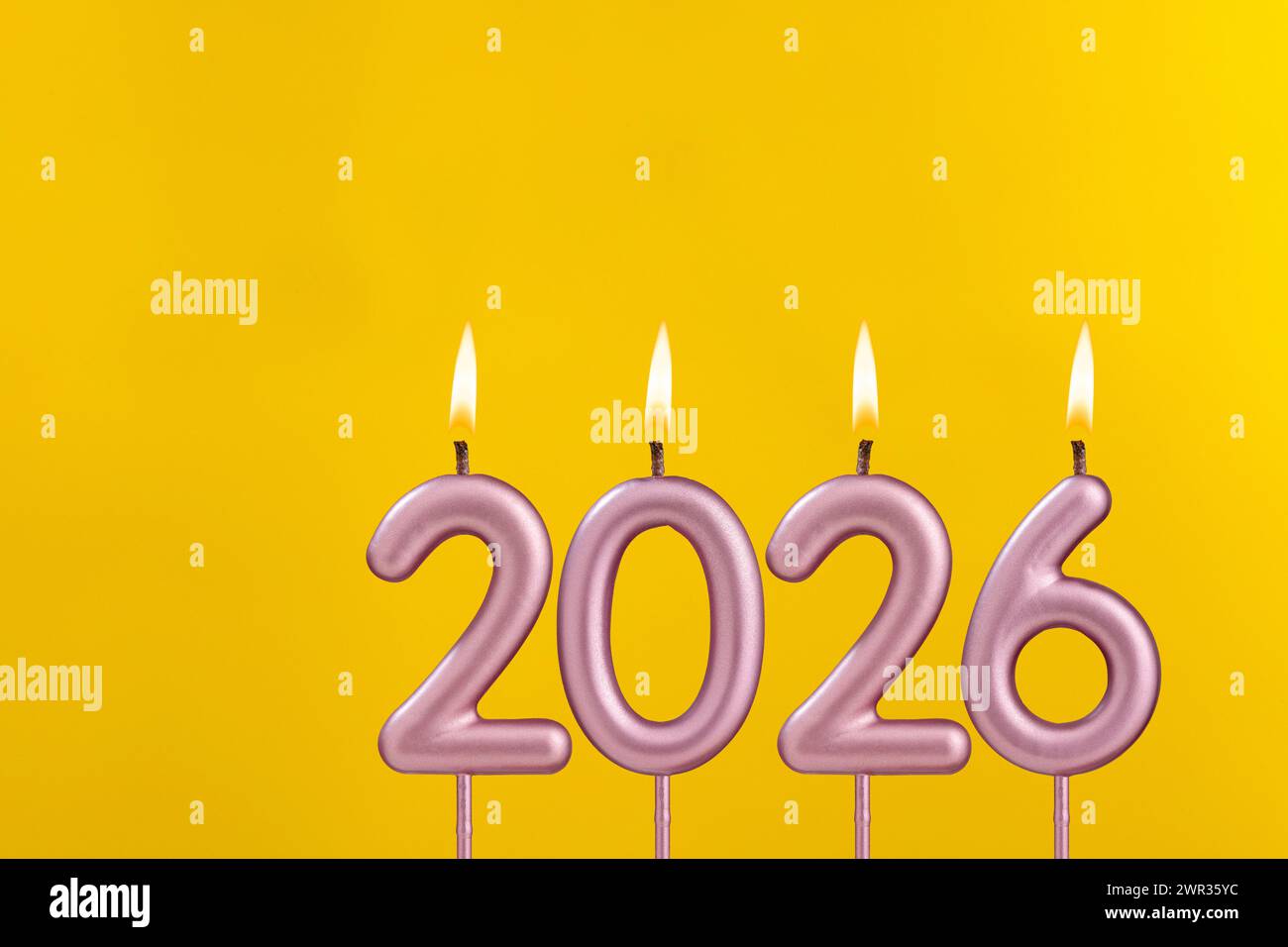 Happy New Year 2026 - Candles in the form of lit numbers Stock Photo ...